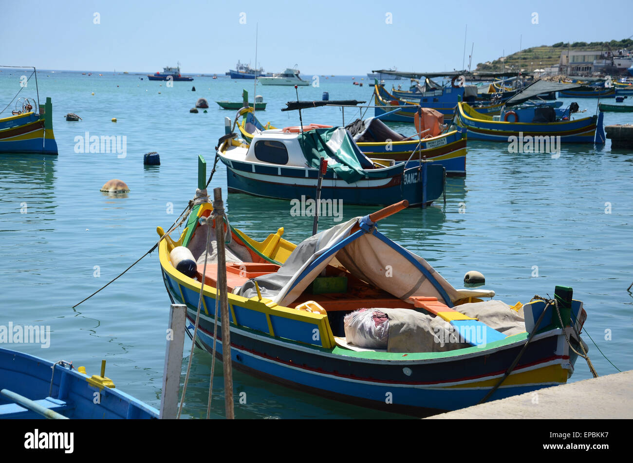 Traditional Maltese luzzu in Marsaxlokk harbour Stock Photo - Alamy