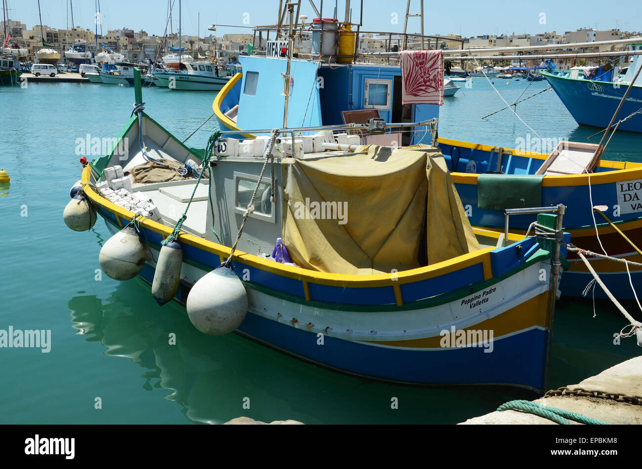 Traditional Maltese luzzu in Marsaxlokk harbour Stock Photo - Alamy