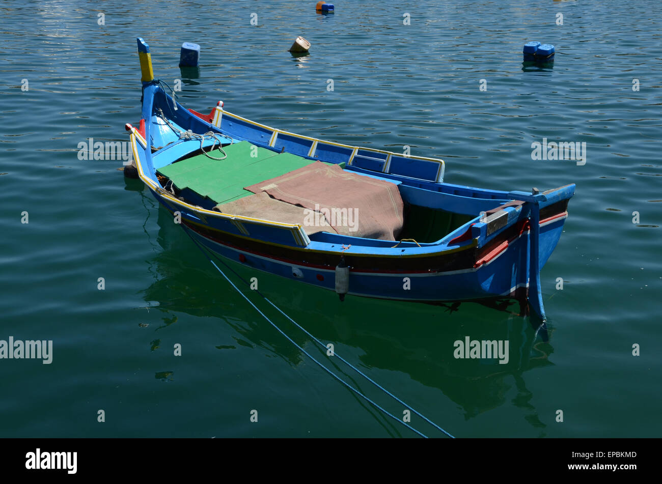 Traditional Maltese luzzu in Marsascala harbour Stock Photo - Alamy