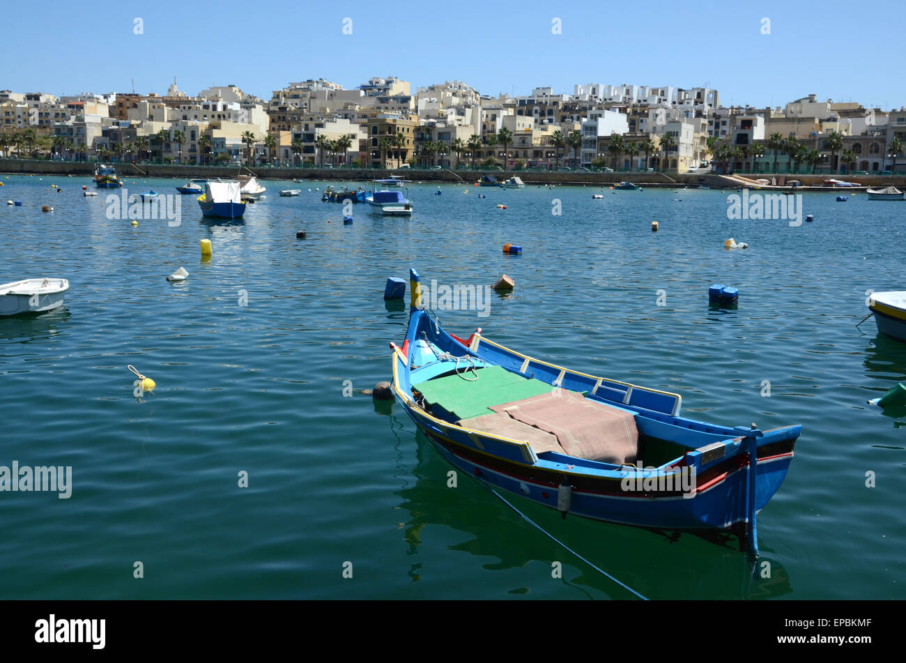 Traditional Maltese luzzu in Marsascala harbour Stock Photo - Alamy