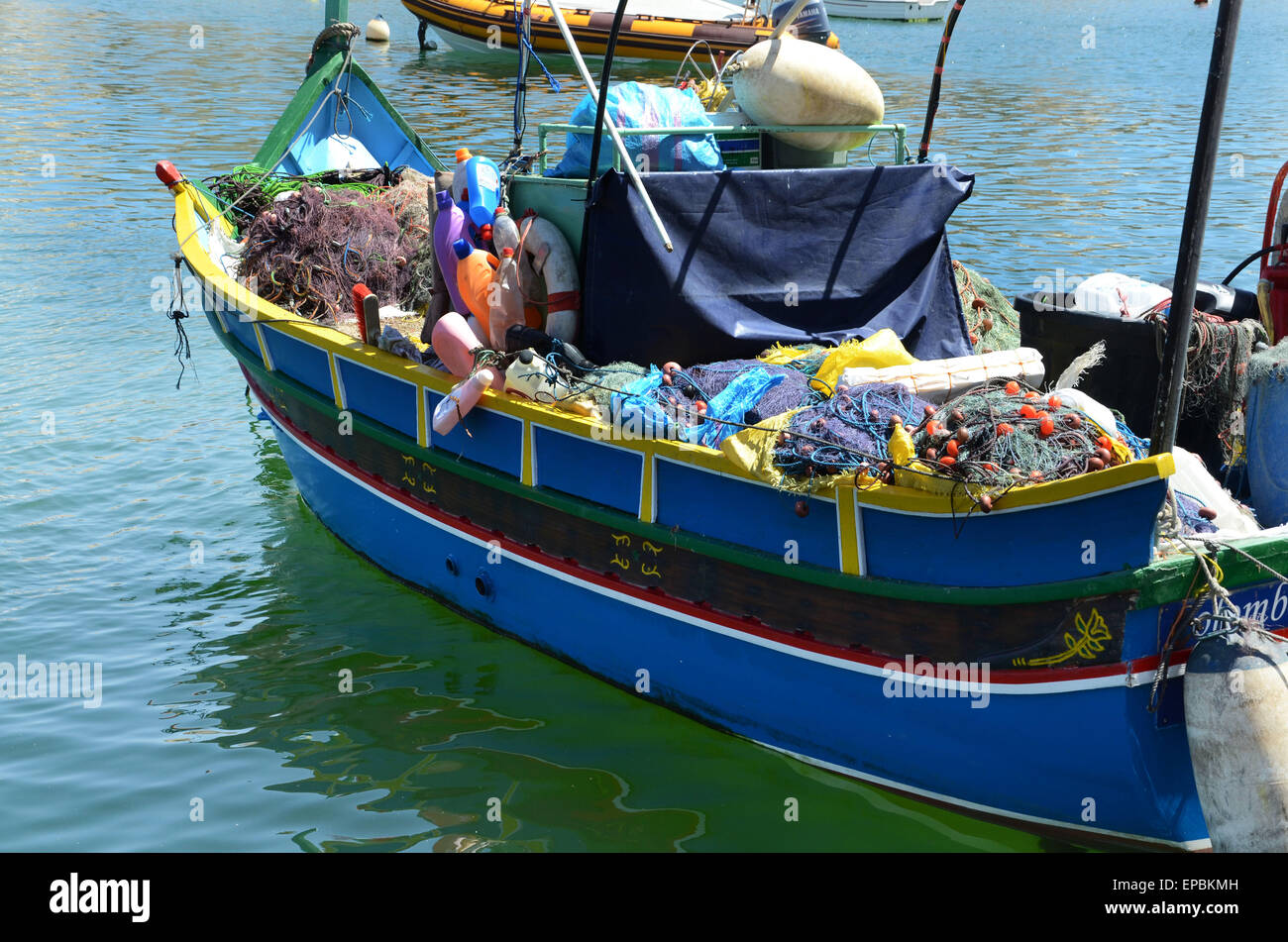 Traditional Maltese luzzu in Marsascala harbour Stock Photo - Alamy