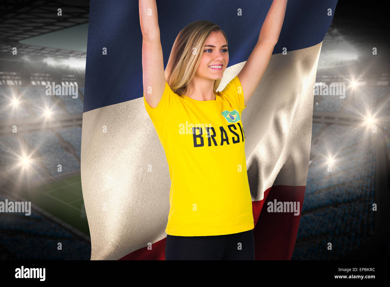 Excited football fan in brasil tshirt holding france flag Stock Photo ...