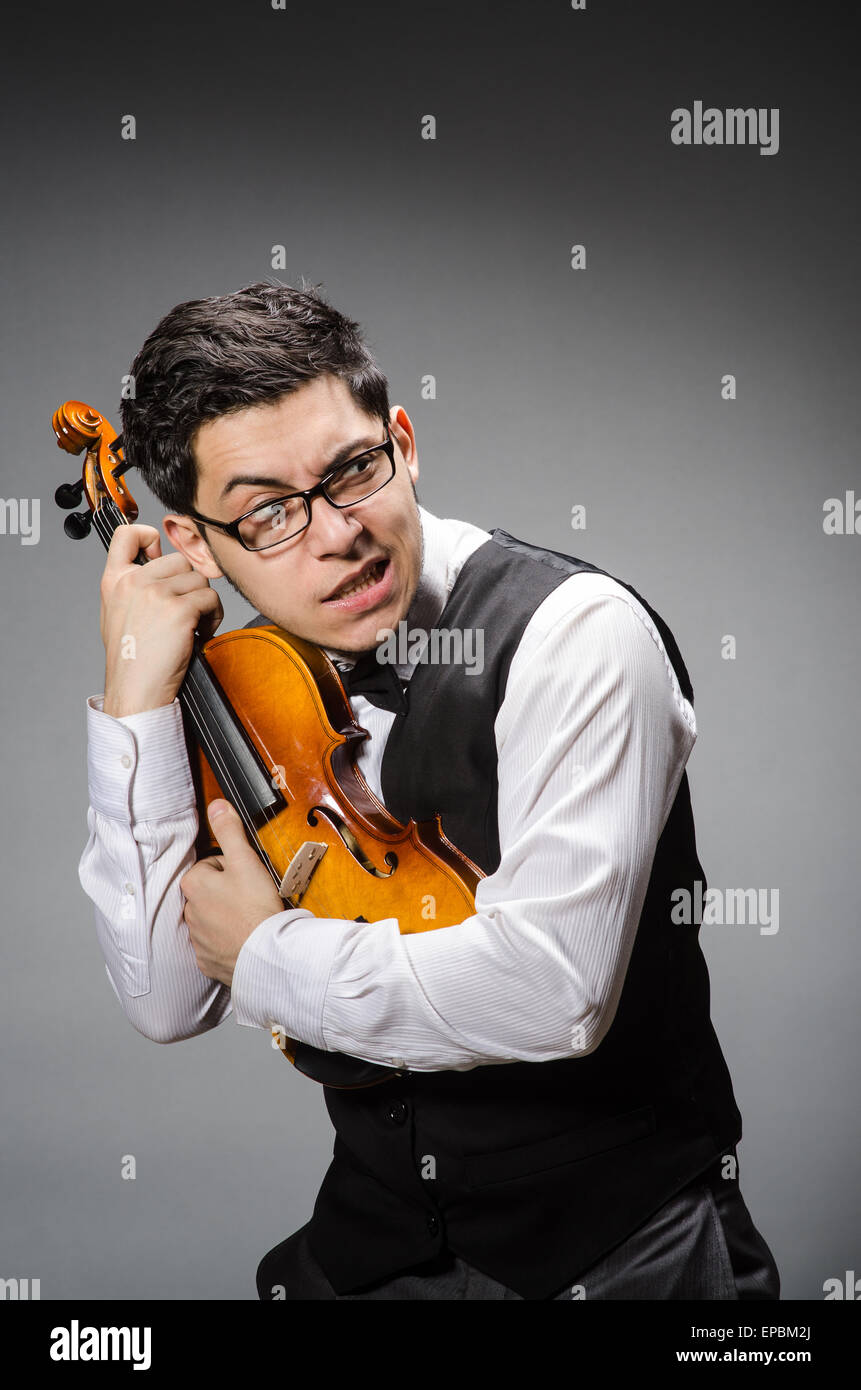 Funny violin player with fiddle Stock Photo - Alamy