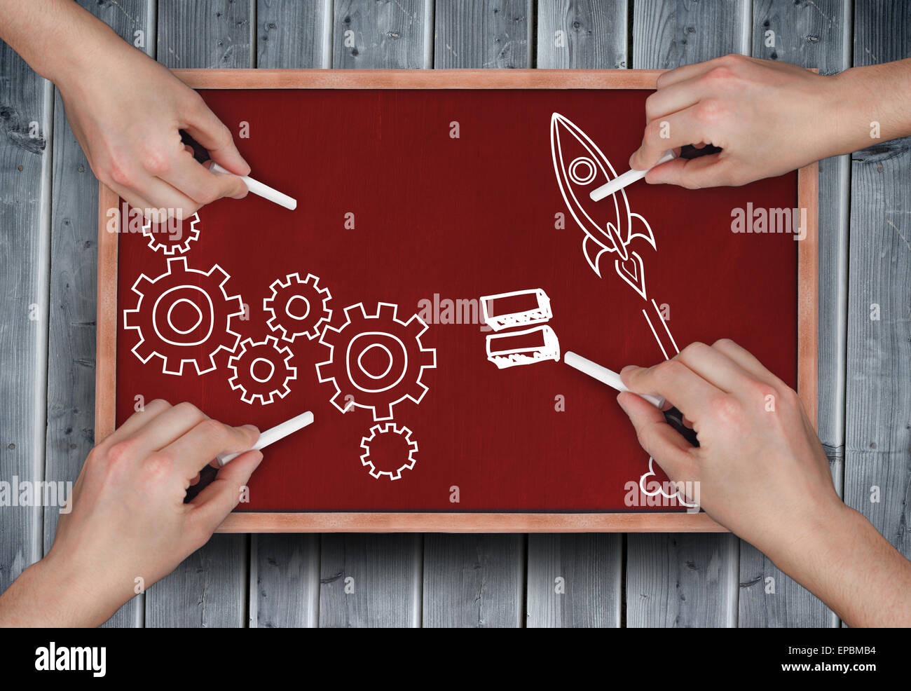 Composite image of multiple hands drawing doodles with chalk Stock ...