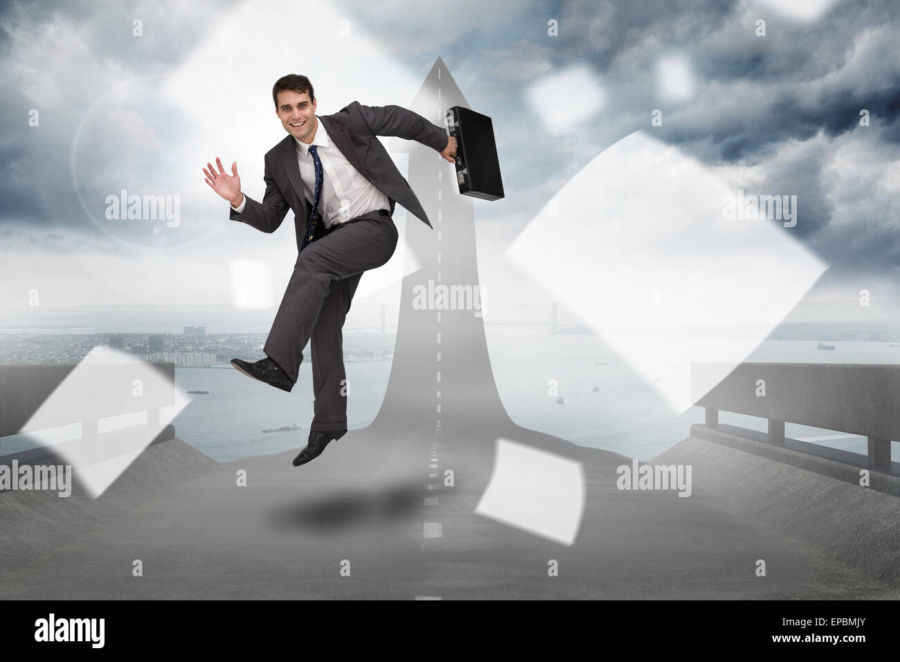 Composite image of smiling businessman in a hurry Stock Photo - Alamy