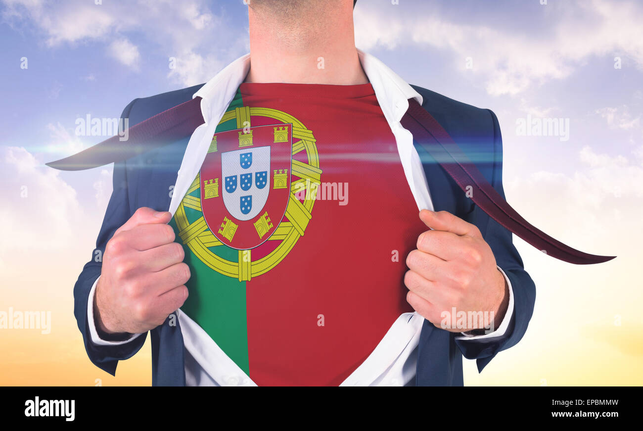 Businessman opening shirt to reveal portugal flag Stock Photo - Alamy