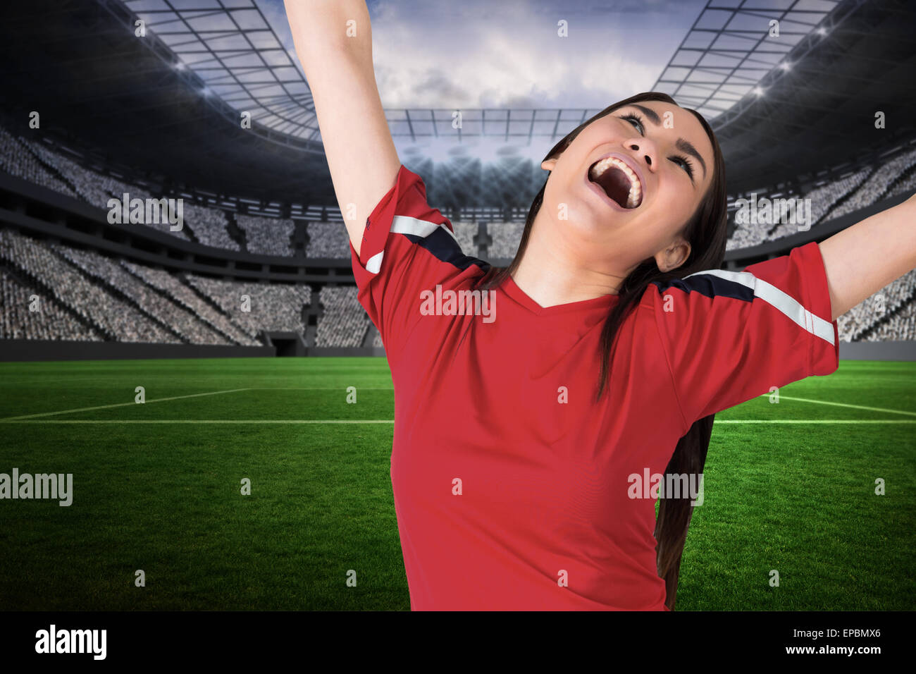 Excited asian football fan cheering Stock Photo - Alamy