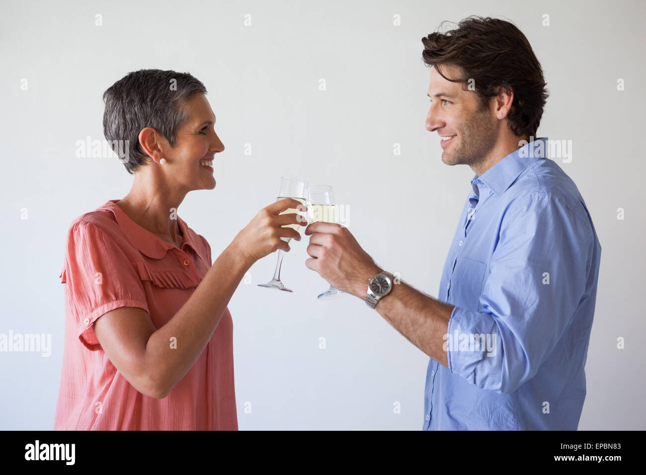 Casual successful business team toasting with champagne Stock Photo - Alamy