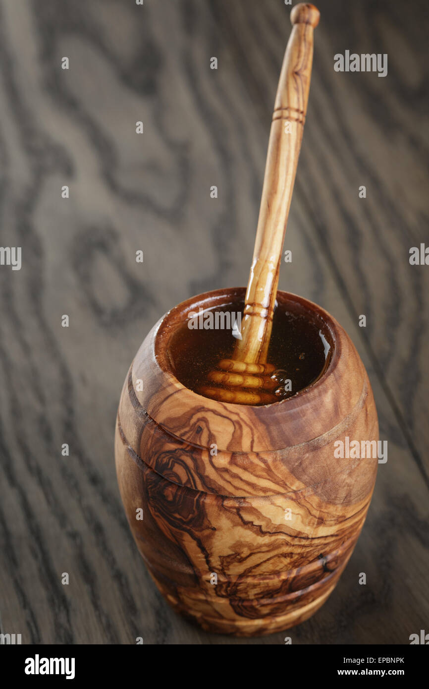 maple honey flowing from dipper to pot, rustic Stock Photo - Alamy