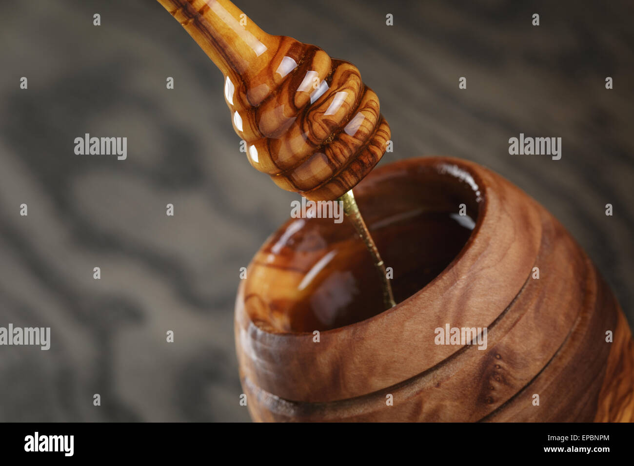 maple honey flowing from dipper to pot, rustic Stock Photo - Alamy