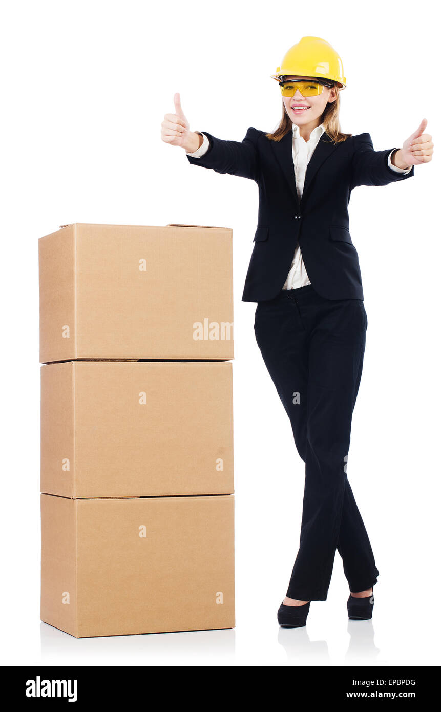 Young builder woman with boxes isolated on white Stock Photo - Alamy