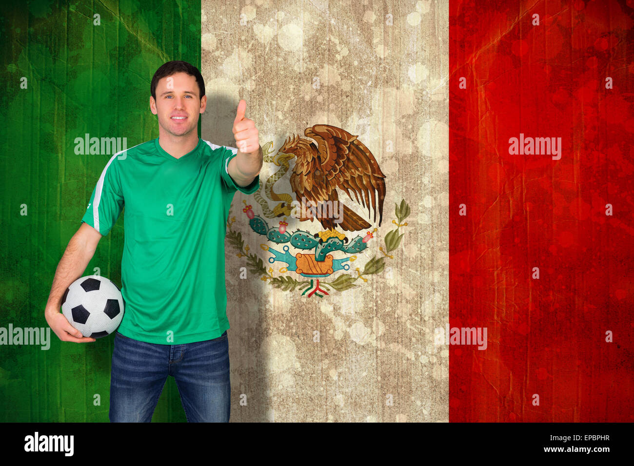 Handsome football fan in green Stock Photo - Alamy