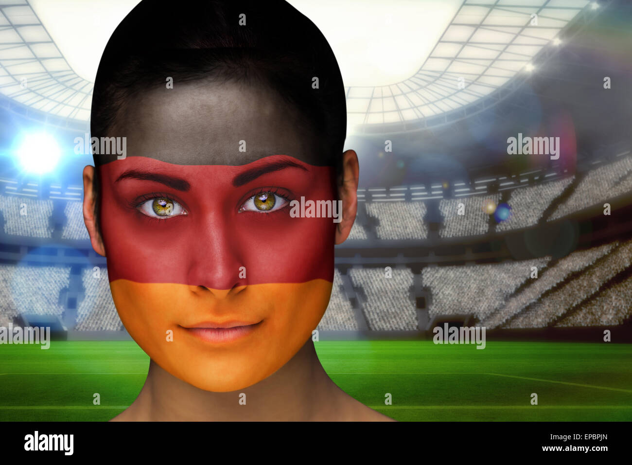 Beautiful germany fan in face paint Stock Photo - Alamy