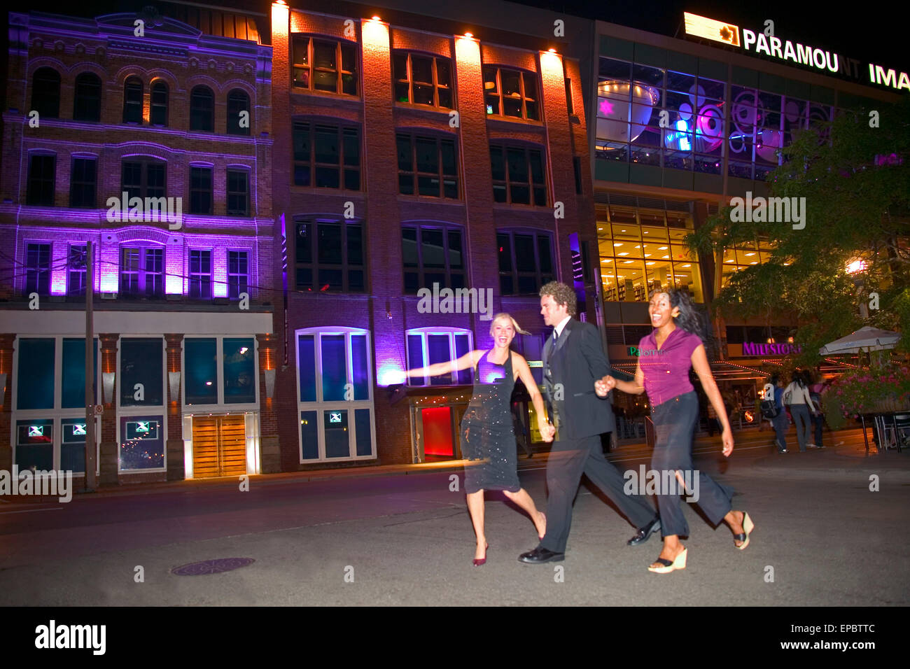 Friends night out holding hands hi-res stock photography and images - Alamy