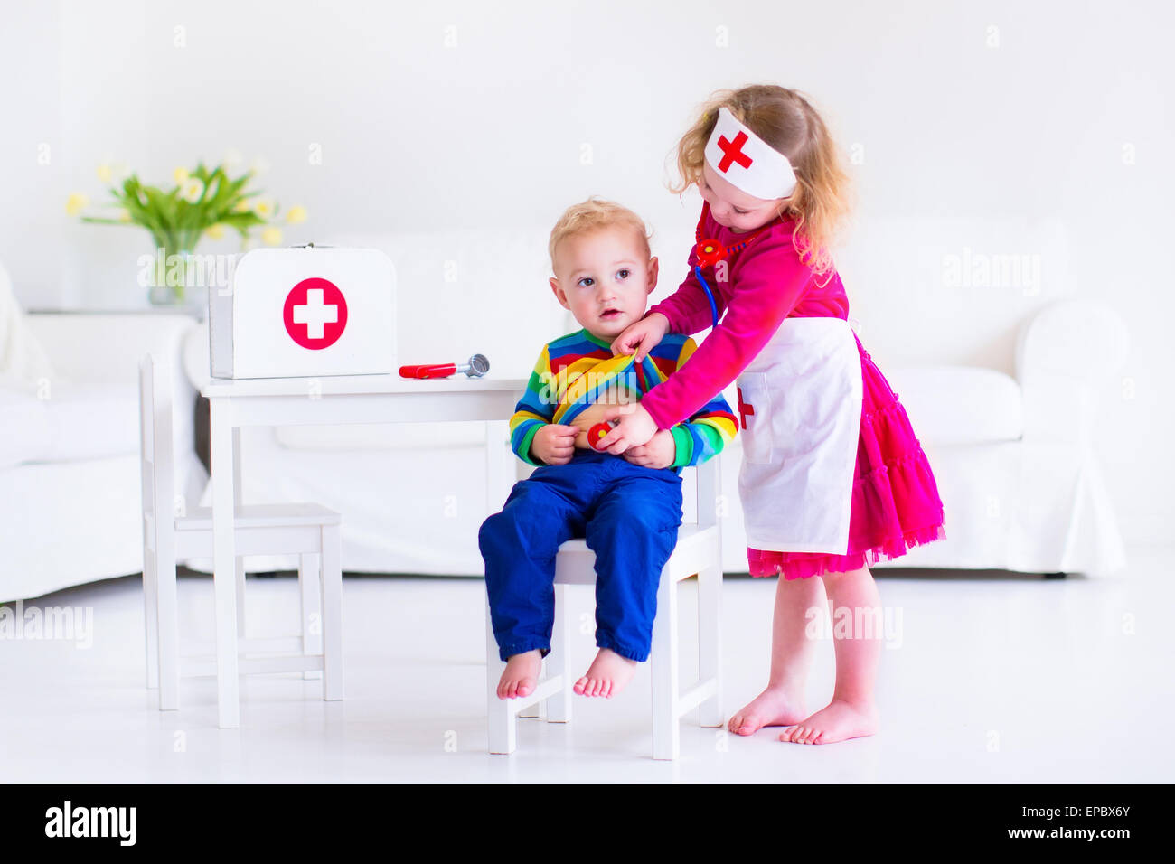Brother sister playing doctor stethoscope hi-res stock photography and ...