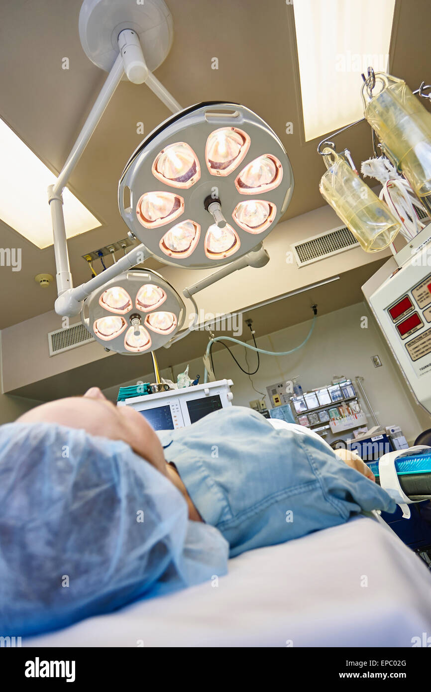 Caucasian patient on operating table in hospital operating room ...