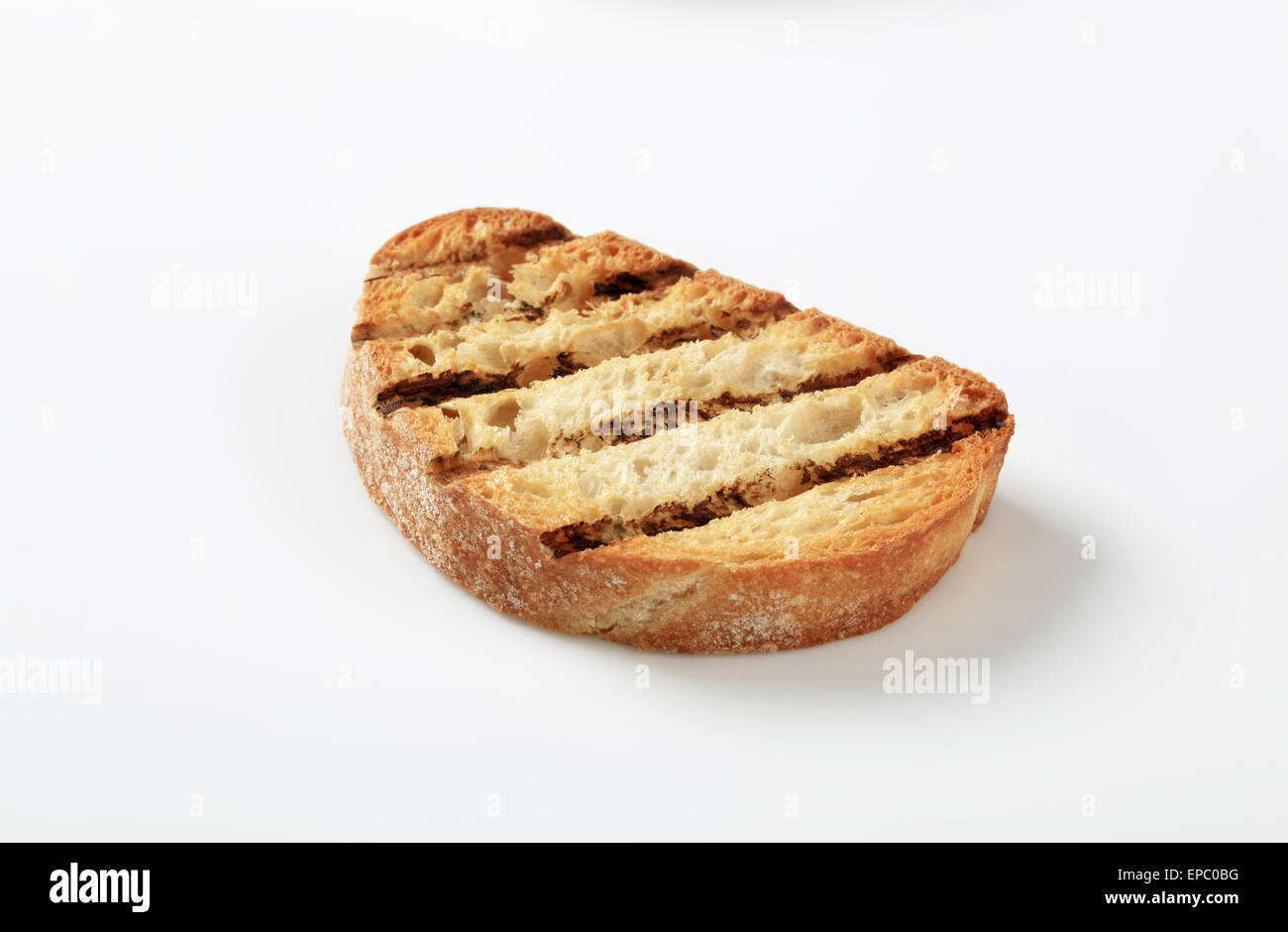 Slice of grill toasted bread Stock Photo - Alamy