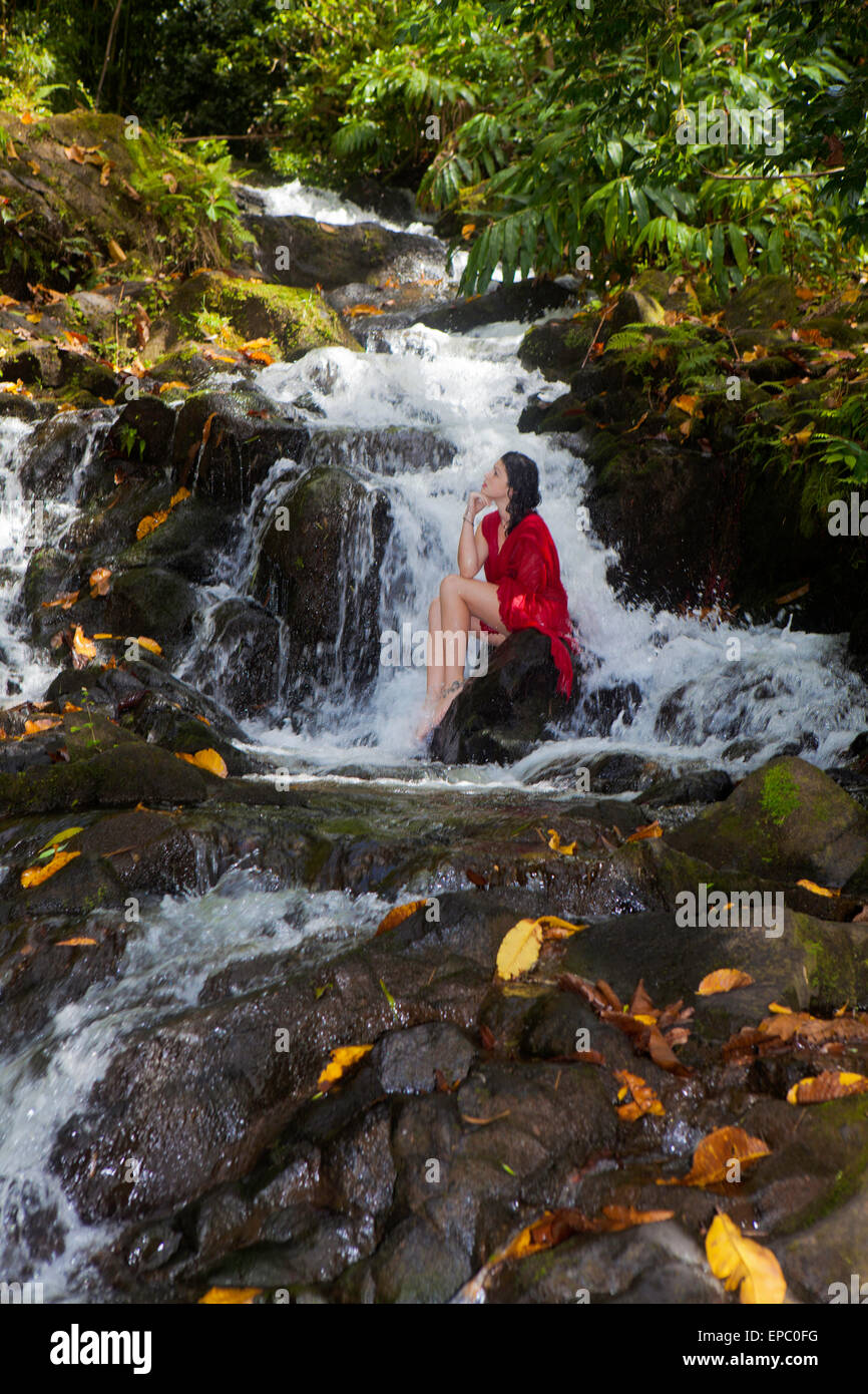 beautiful girl in a waterfall in Hawaii Stock Photo - Alamy