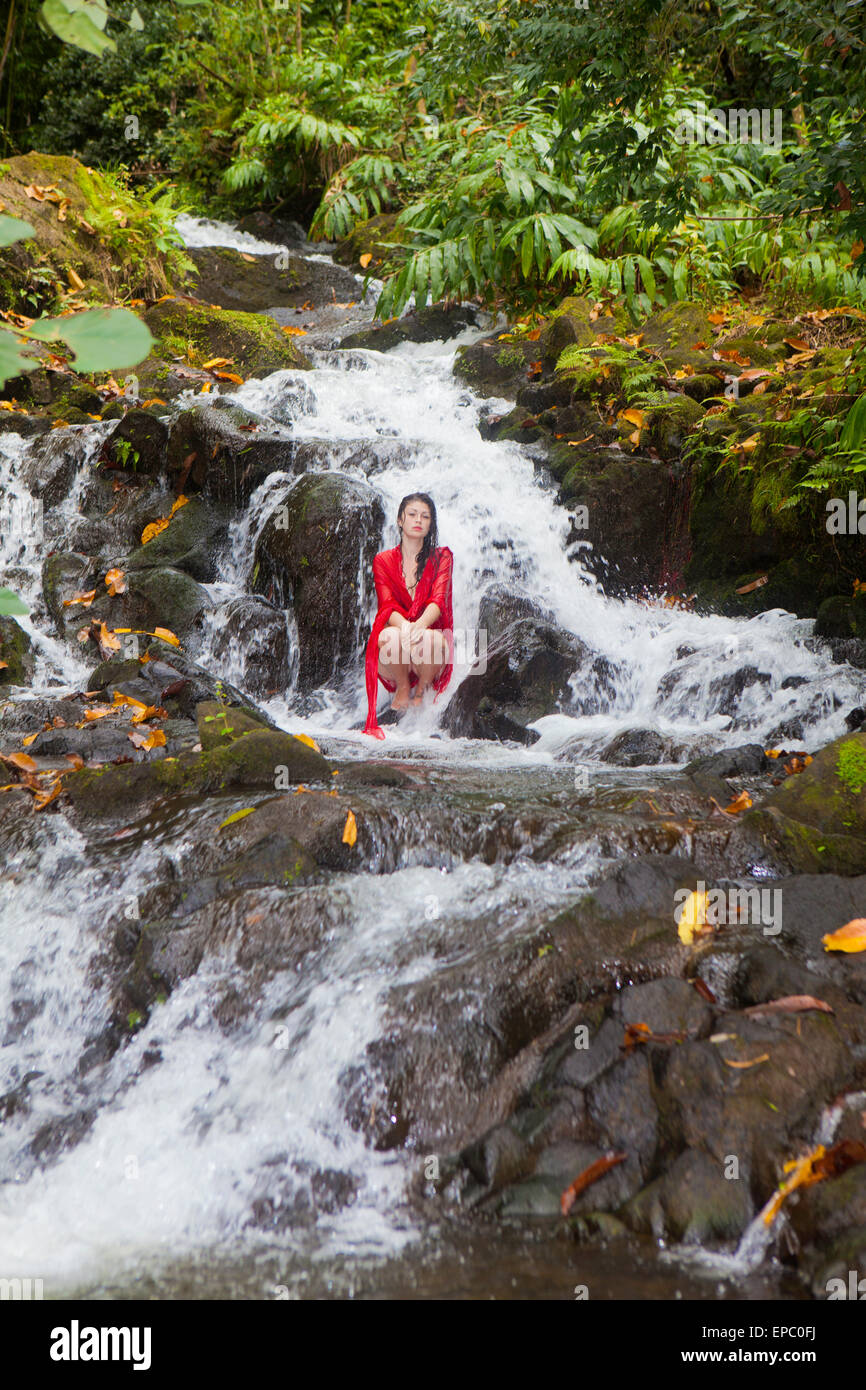 beautiful girl in a waterfall in Hawaii Stock Photo - Alamy