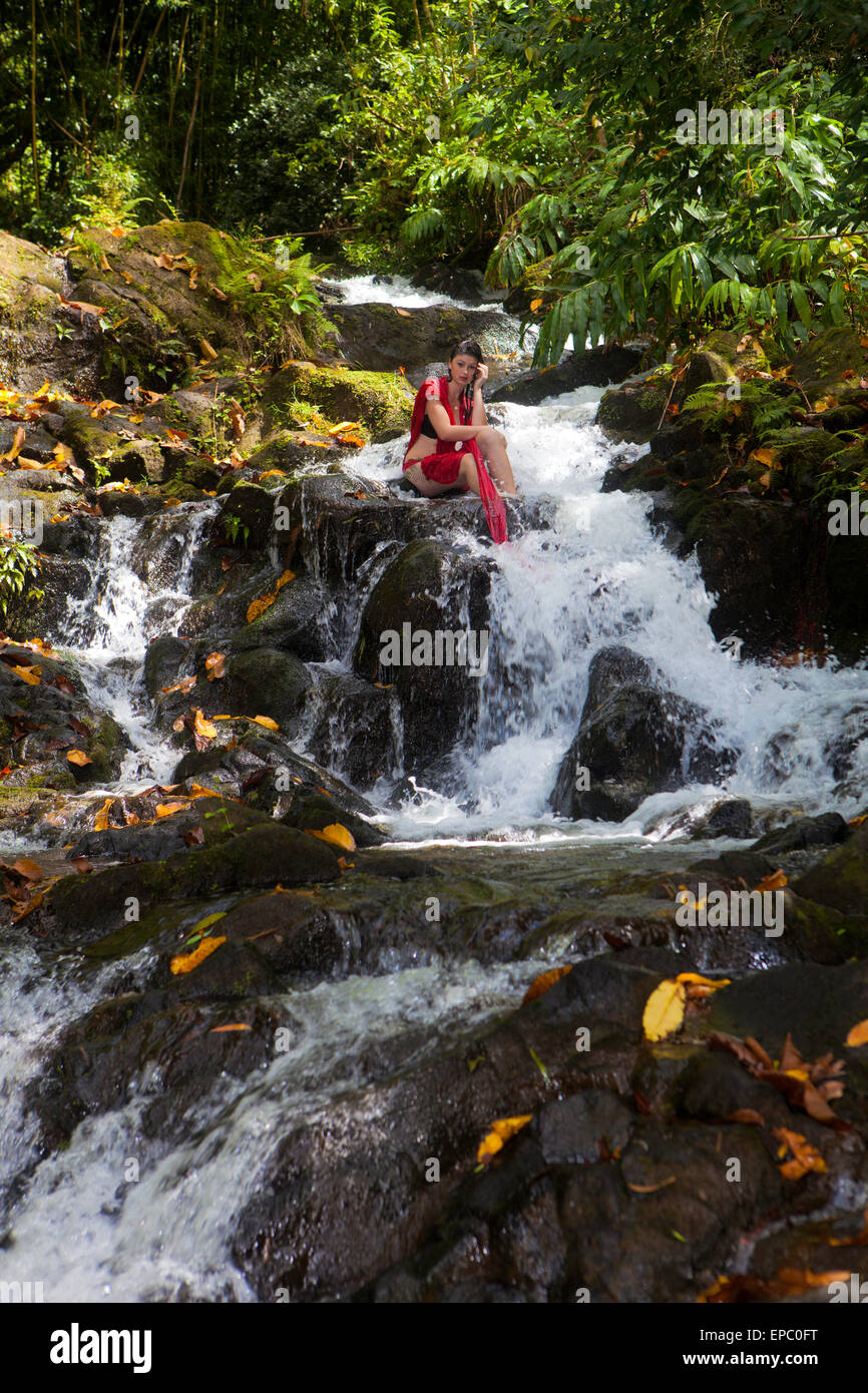 beautiful girl in a waterfall in Hawaii Stock Photo - Alamy