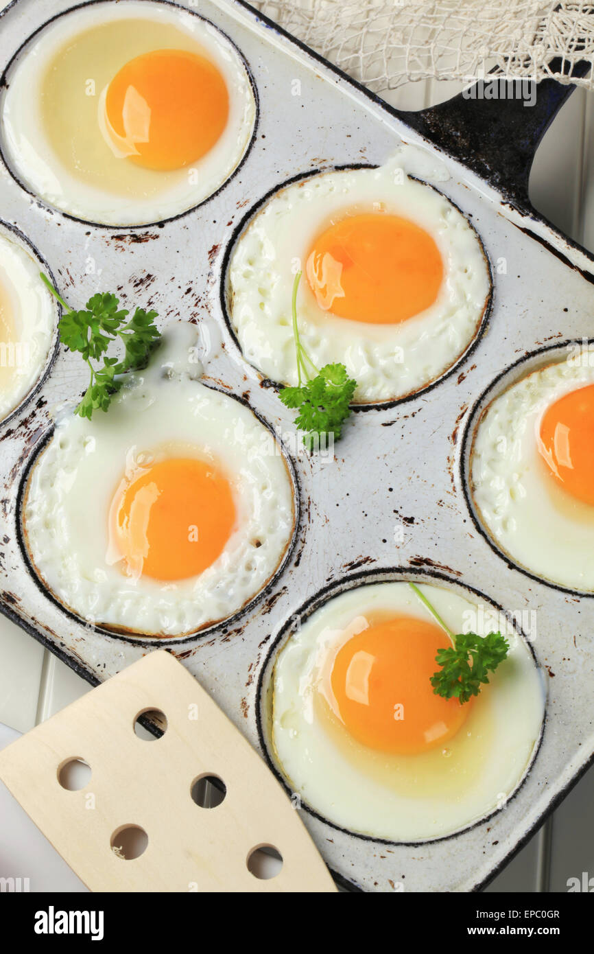 Fried sunny side up eggs - detail Stock Photo - Alamy