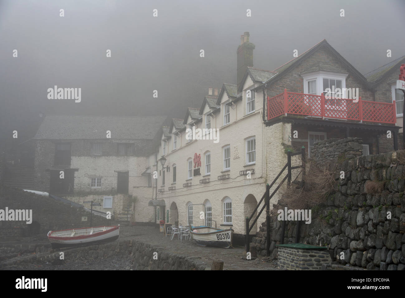 Red Lion Hotel on a foggy morning; Clovelly, Devon, England Stock Photo ...
