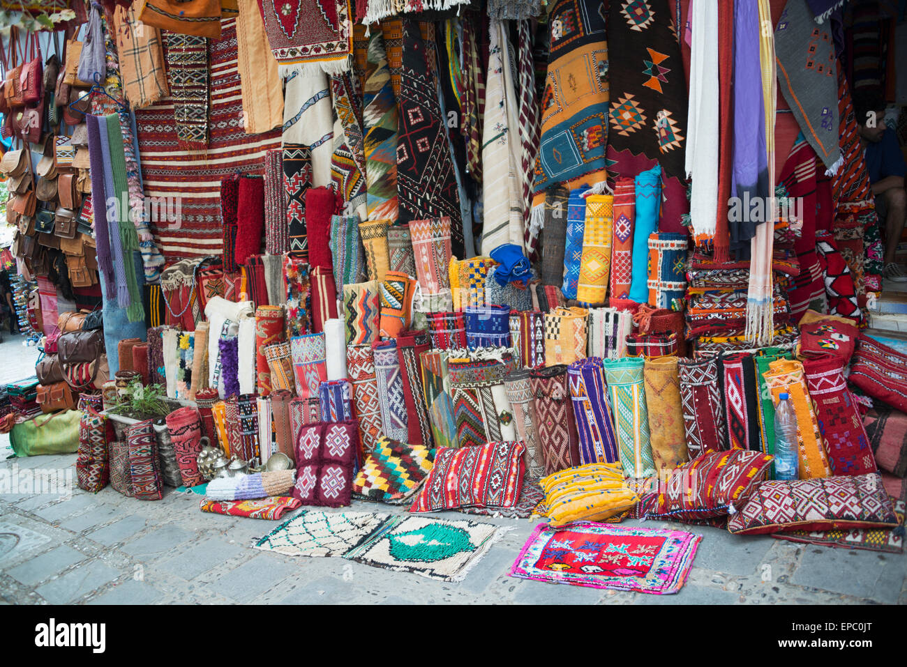 Colourful rugs and carpets on display for sale; Chefchaouen, Morocco ... Colourful rugs and carpets on display for sale; Chefchaouen, Morocco ...
