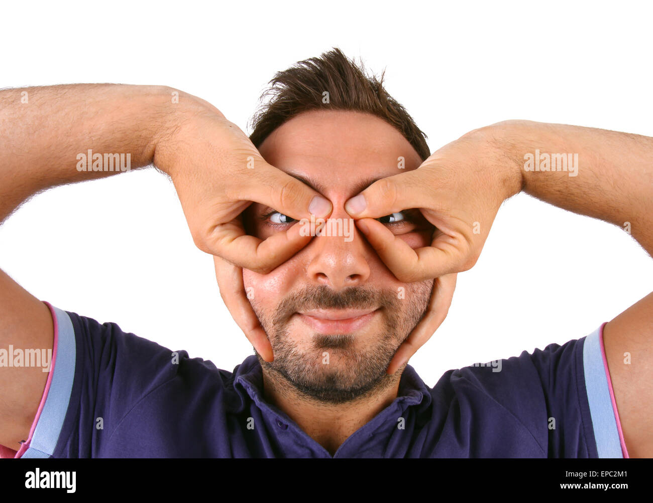 Young man winces with his hands over his eyes on white background Stock ...