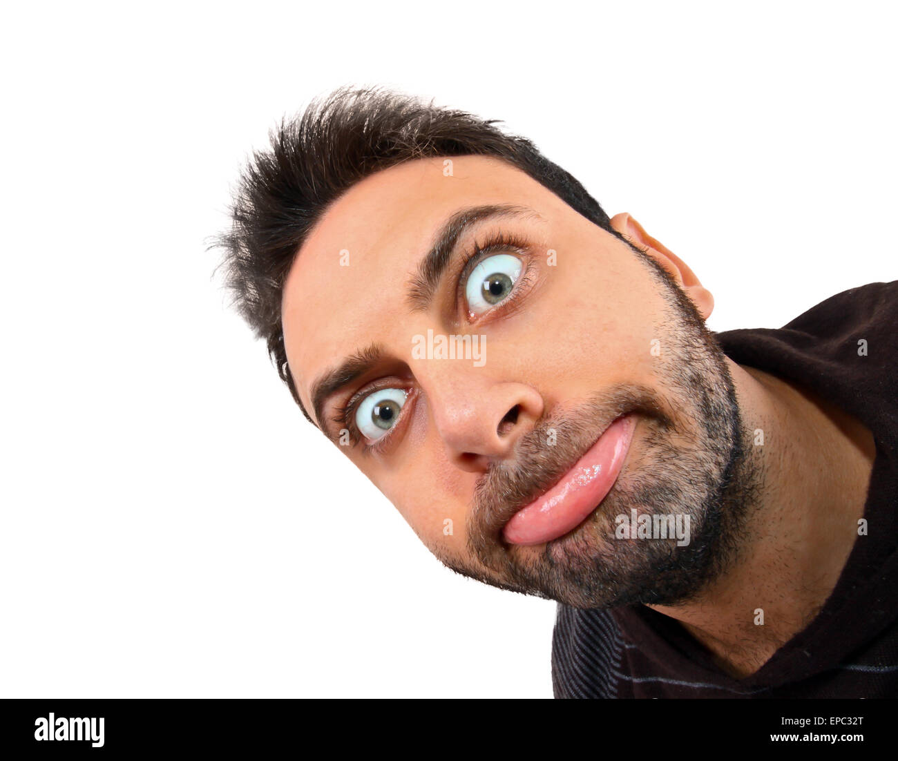 Young man with funny expression on white background Stock Photo - Alamy