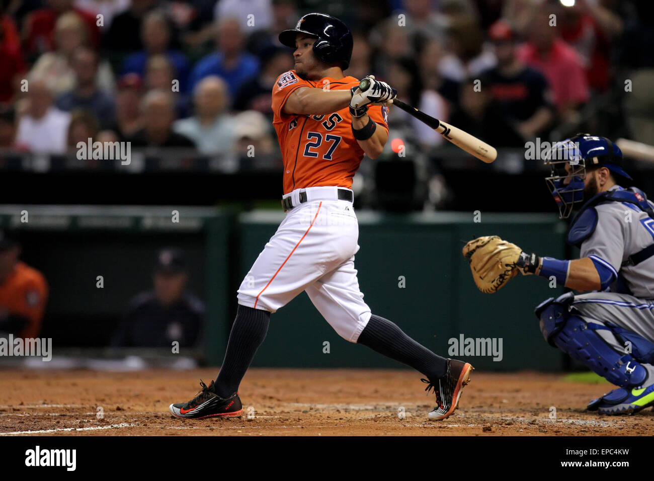 Houston, TX, USA. 15th May, 2015. Houston Astros second baseman Jose Altuve #27 swings and hits ...