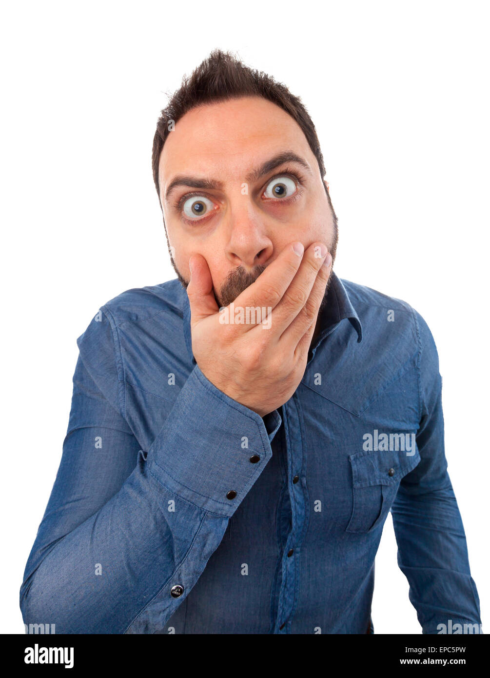 Young man with expression of fright on white background Stock Photo - Alamy