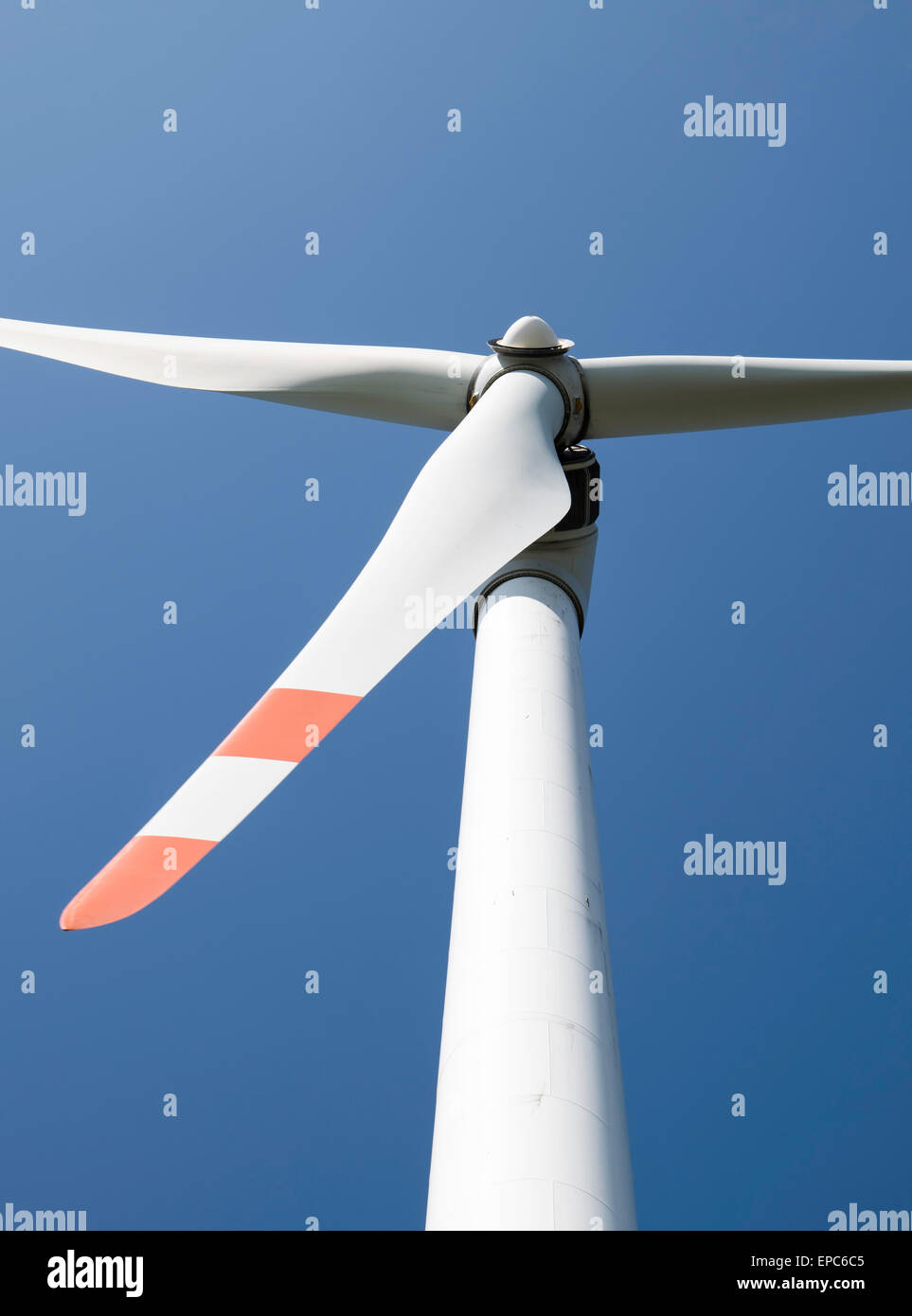 single wind turbine produces green clean energy Stock Photo - Alamy