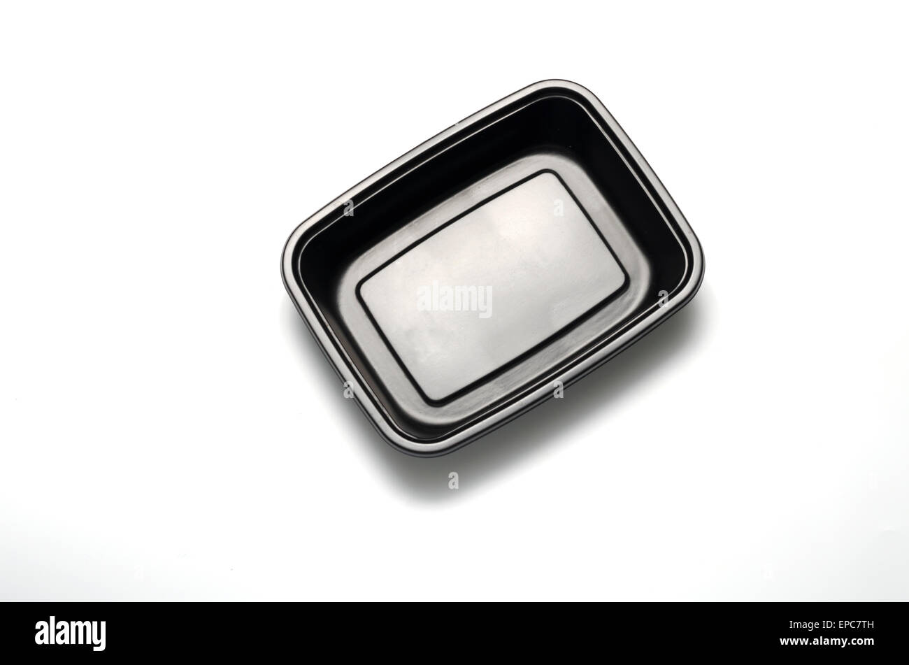 black plastic container on a white background Stock Photo - Alamy