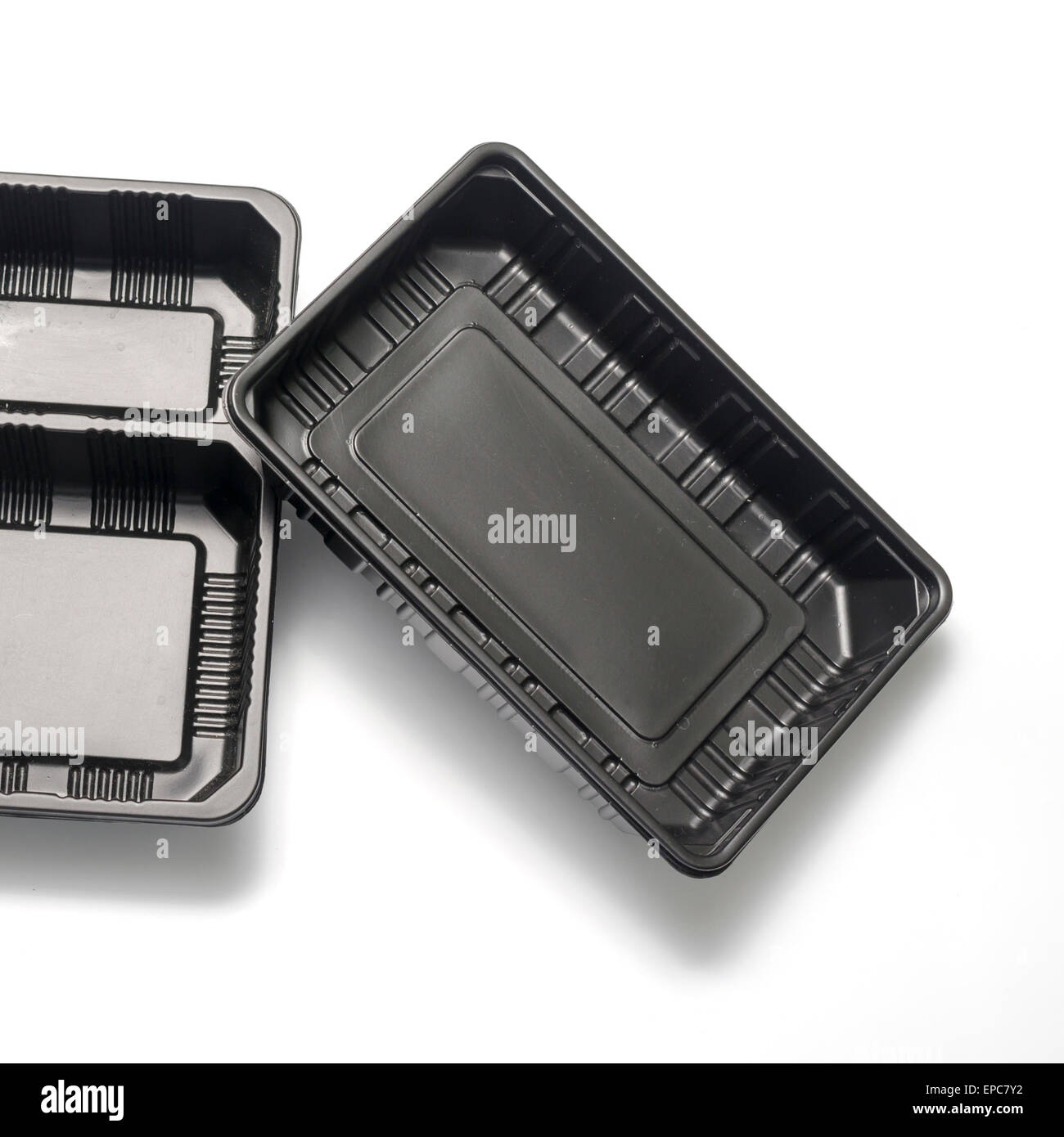 black plastic container on a white background Stock Photo - Alamy
