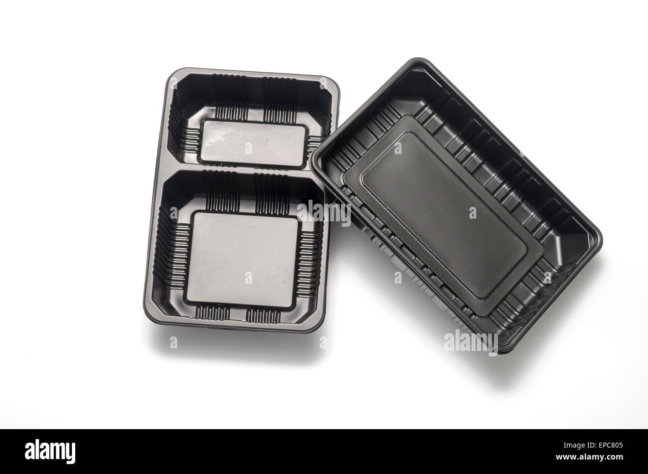 black plastic container on a white background Stock Photo - Alamy