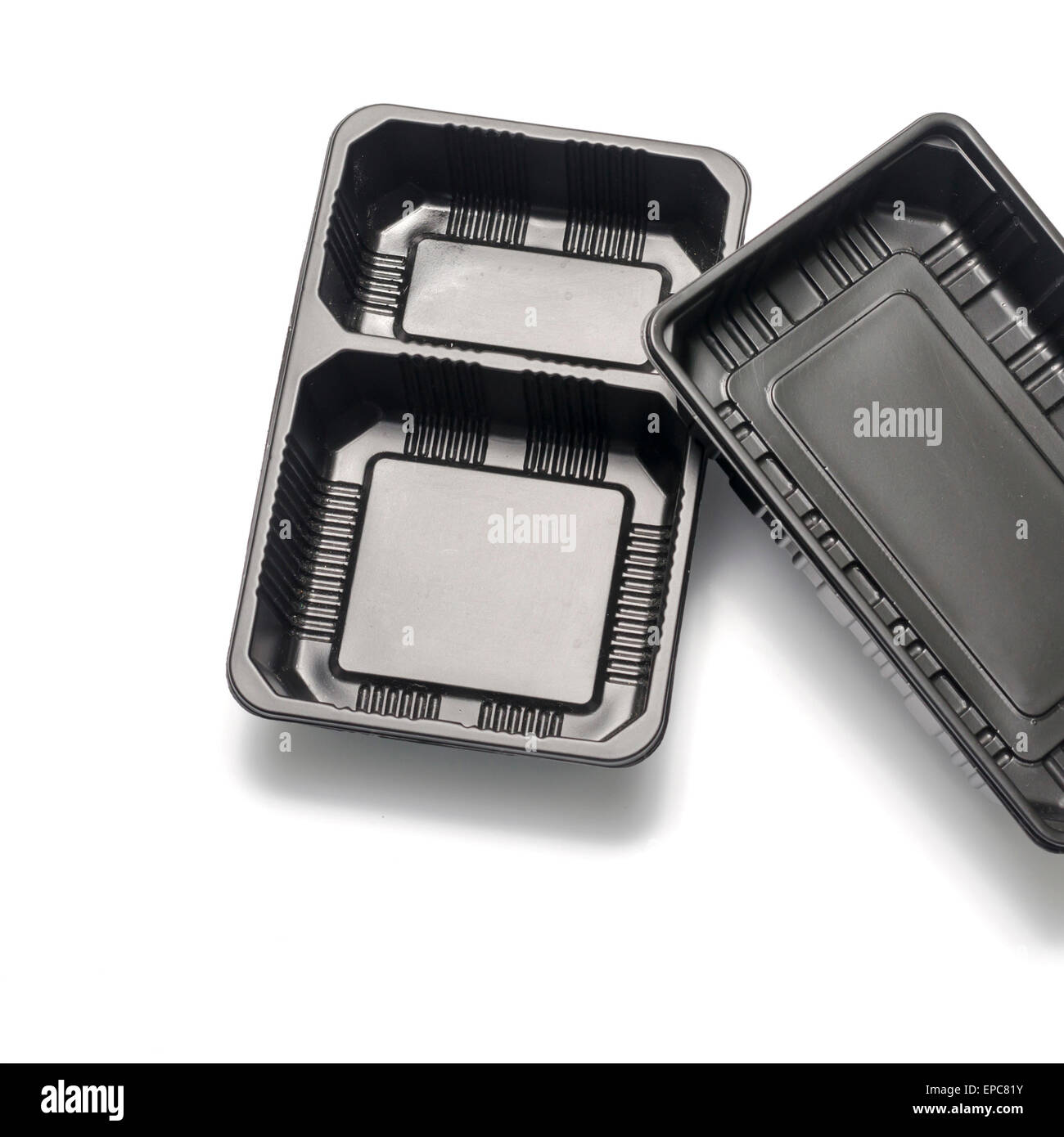 black plastic container on a white background Stock Photo - Alamy