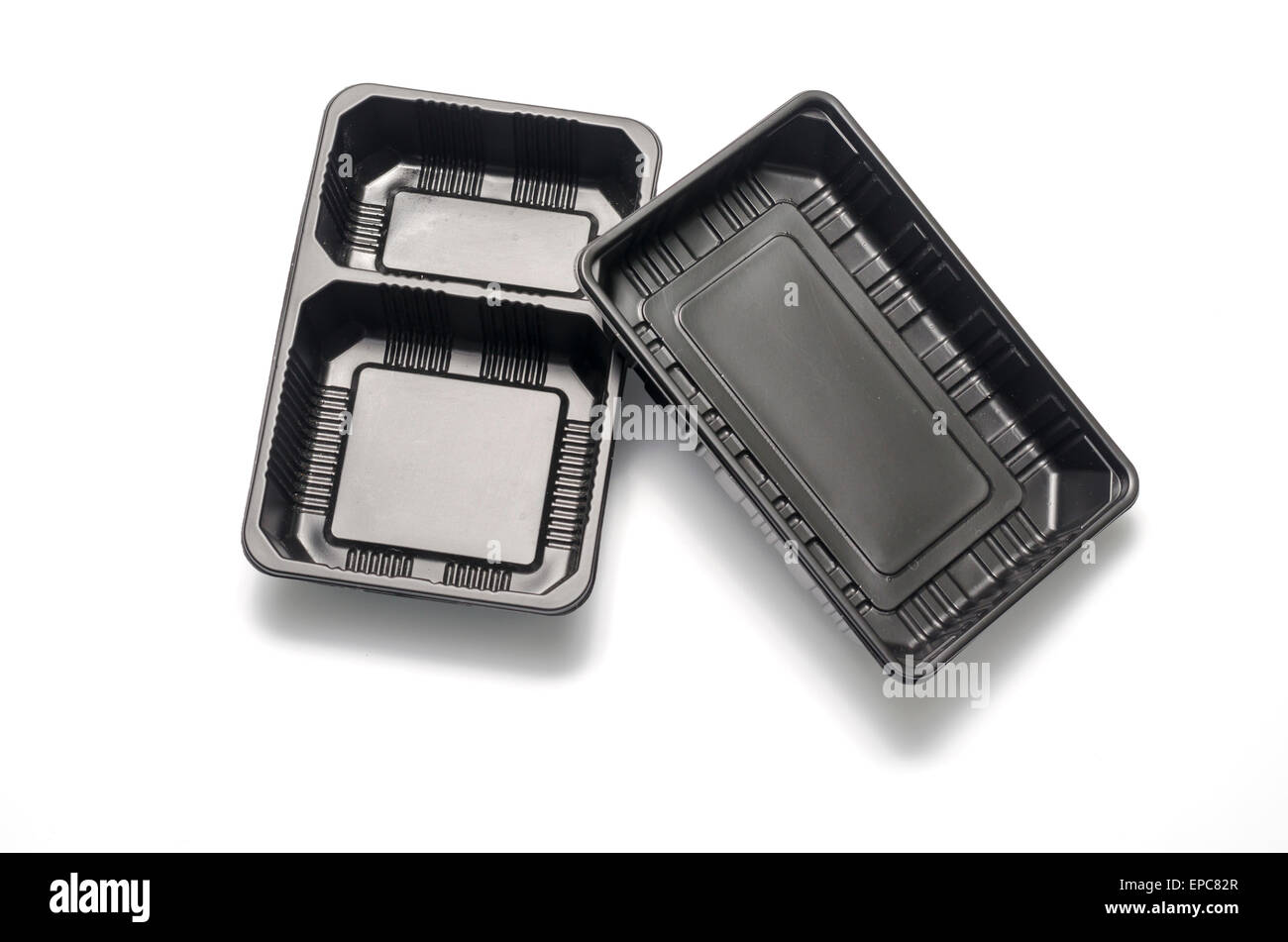 black plastic container on a white background Stock Photo - Alamy