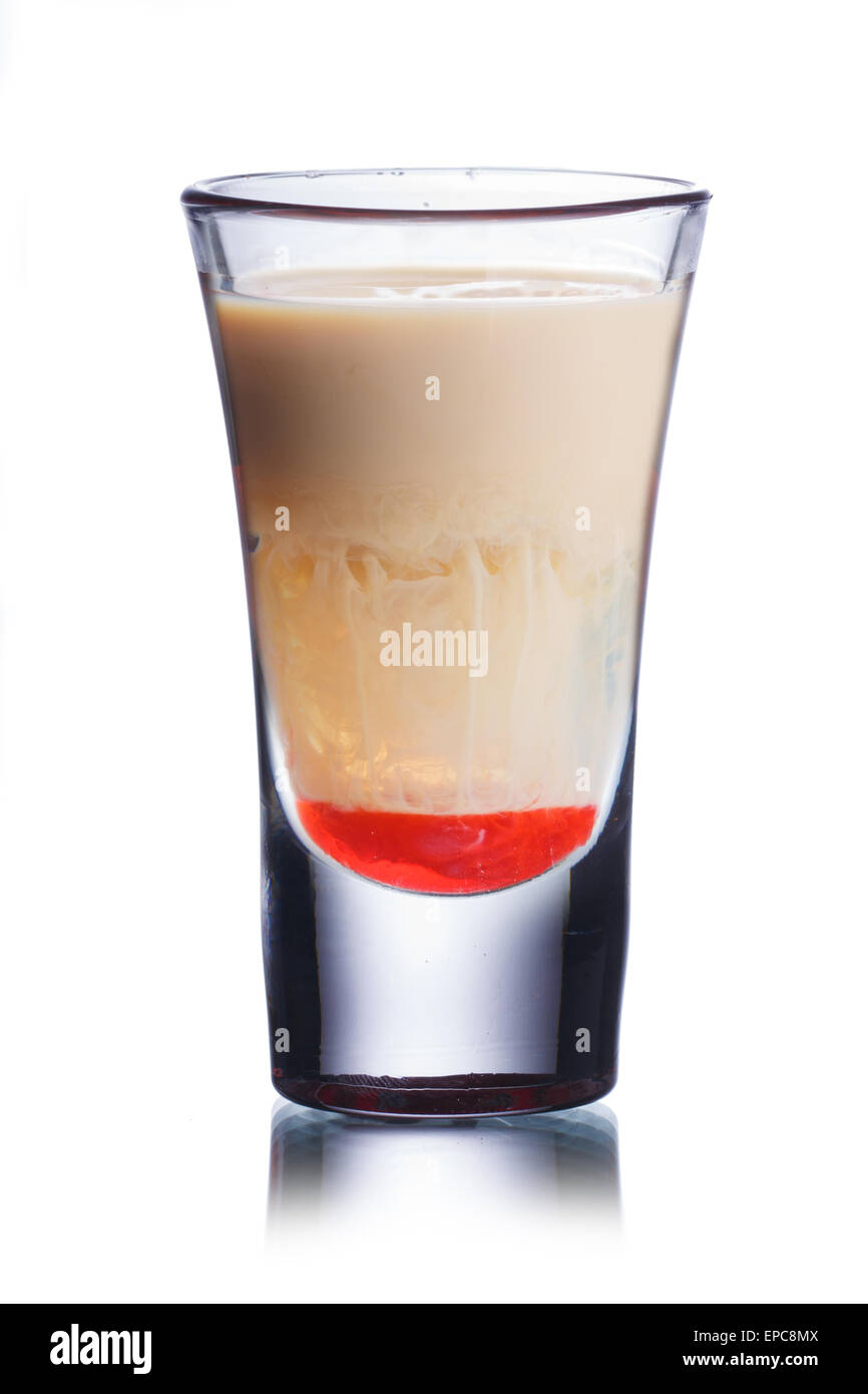 Alcoholic cocktail in shot glass isolated on white Stock Photo - Alamy