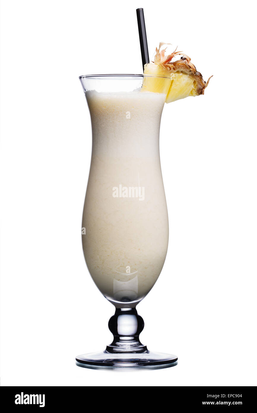 Alcoholic cocktail in hurricane glass decorated with pineapple slice ...