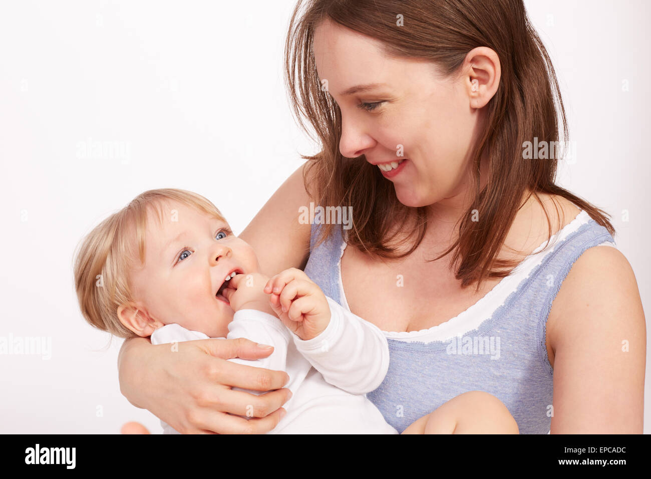 Parents hug child hi-res stock photography and images - Alamy