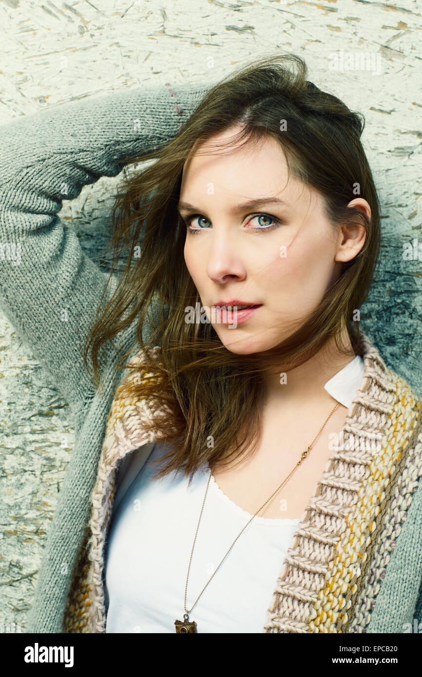 Young woman cool on the wall Stock Photo - Alamy