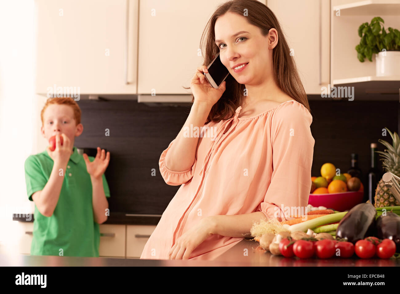 mother and child in the kitchen Stock Photo - Alamy