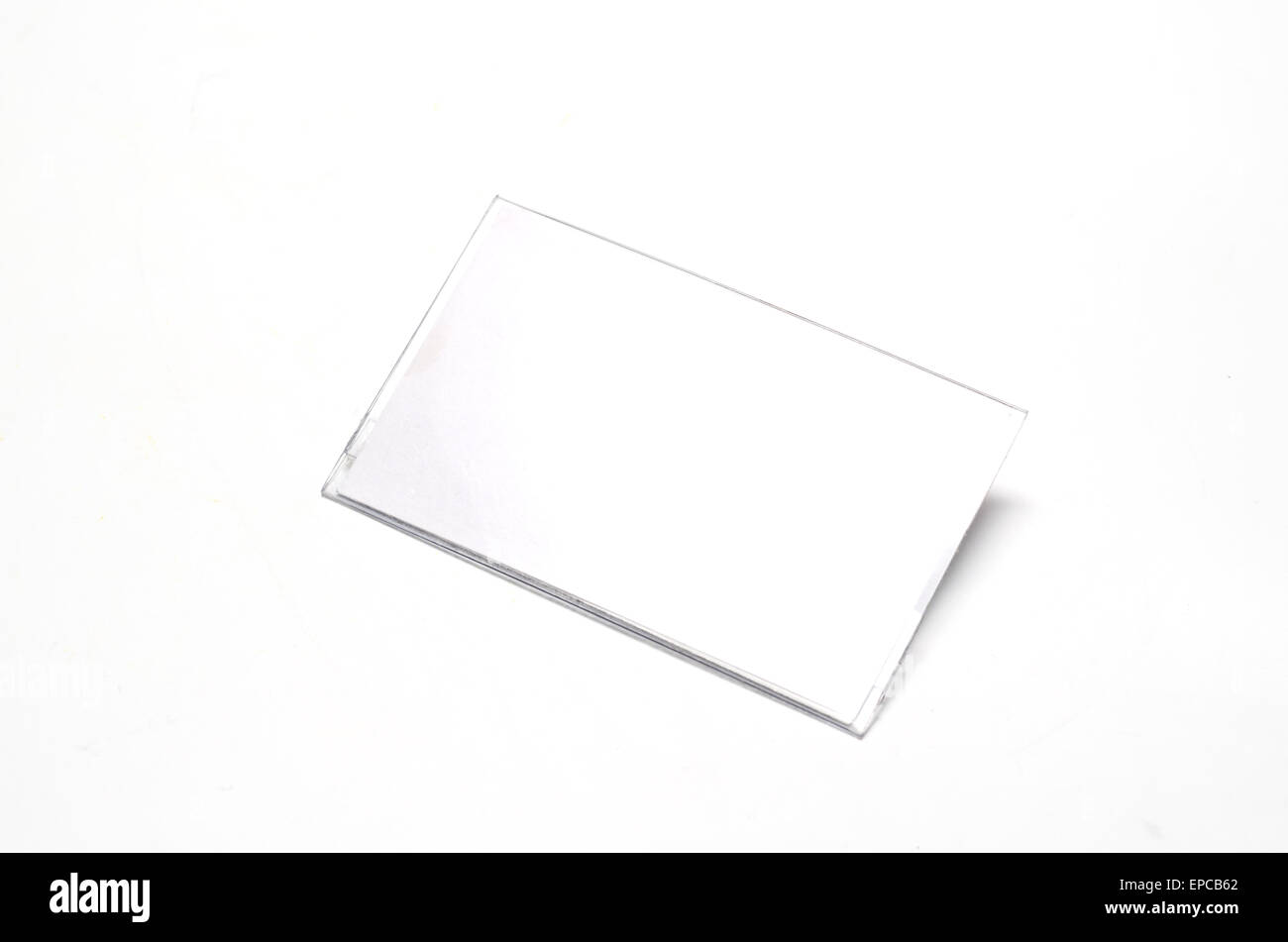 plastic name tag on a white background Stock Photo - Alamy