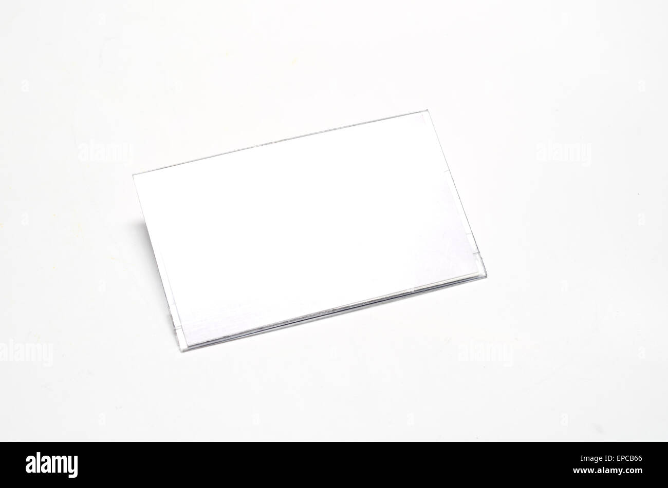 plastic name tag on a white background Stock Photo - Alamy