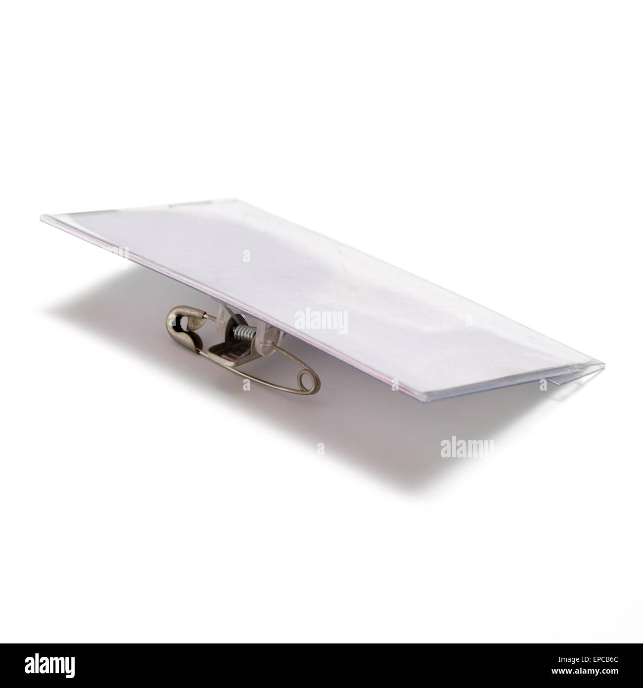 plastic name tag on a white background Stock Photo - Alamy