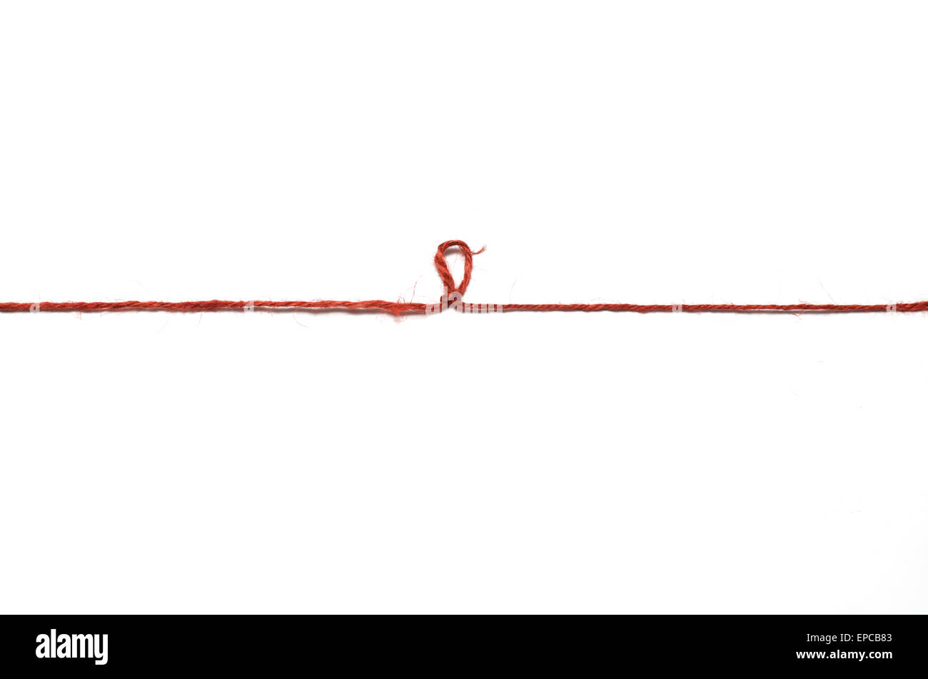 red rope on a white background Stock Photo - Alamy