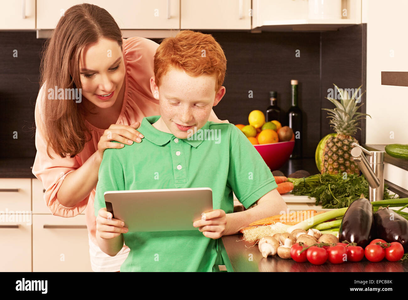 mother and child in the kitchen Stock Photo - Alamy