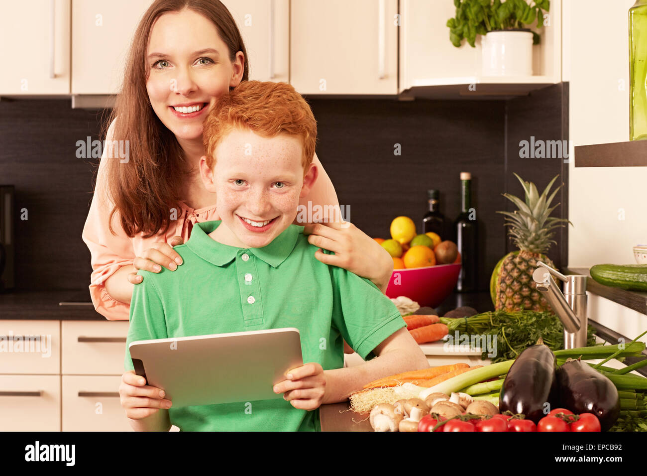 mother and child in the kitchen Stock Photo - Alamy