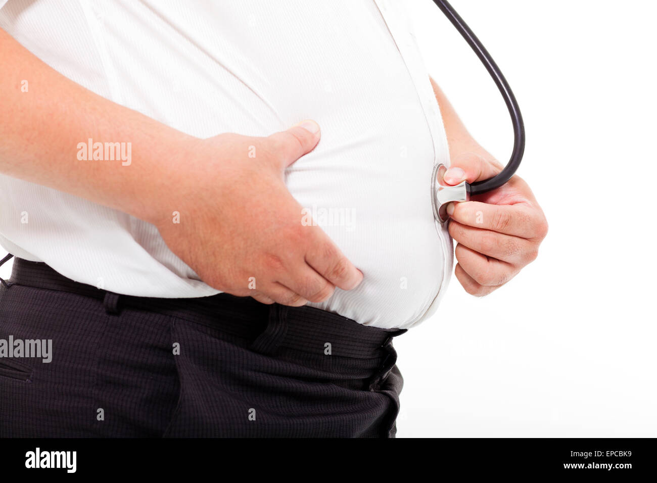 fat Man holding stethoscope for medical exam concept Stock Photo - Alamy