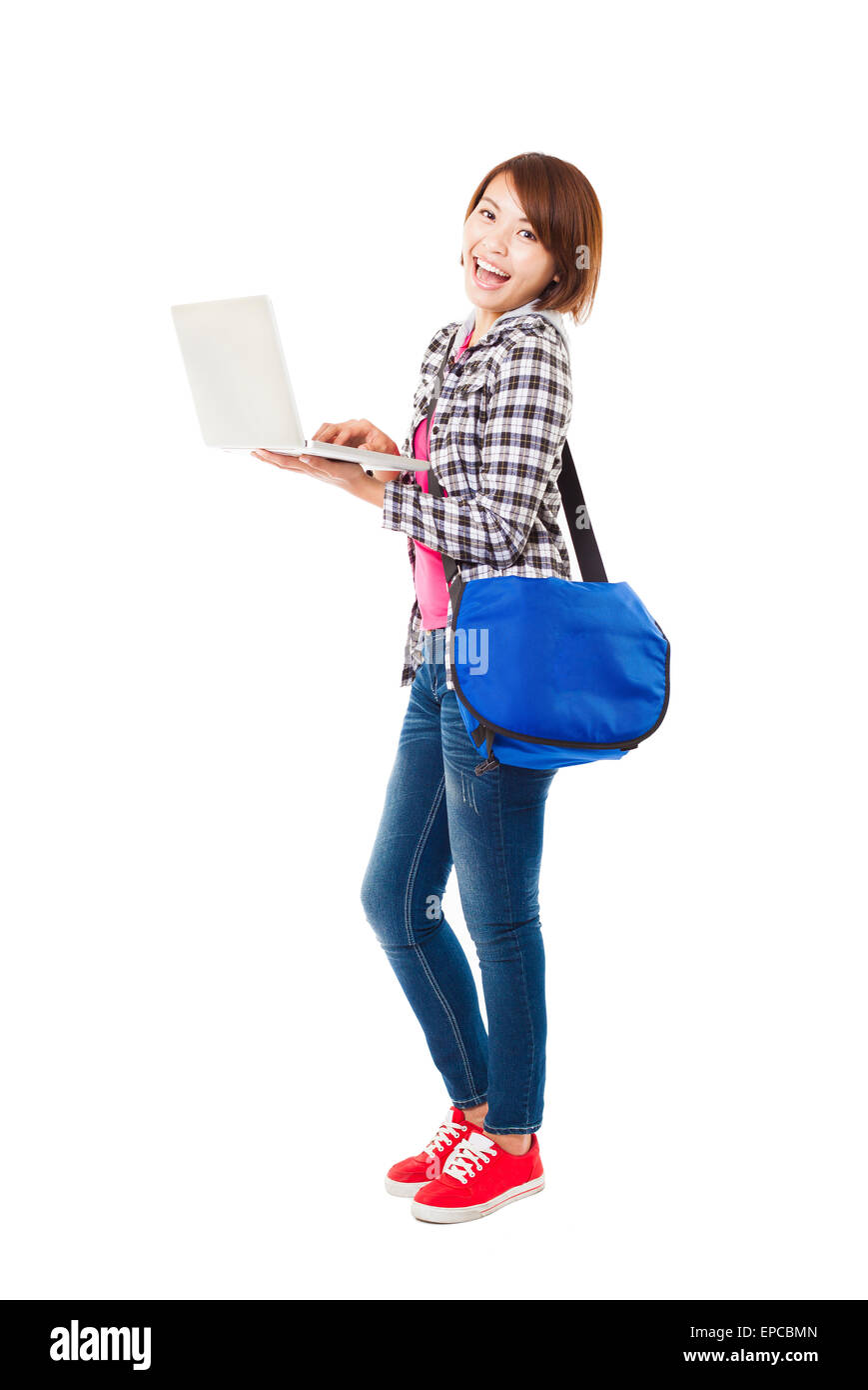 Young happy student with laptop and isolated on white Stock Photo - Alamy